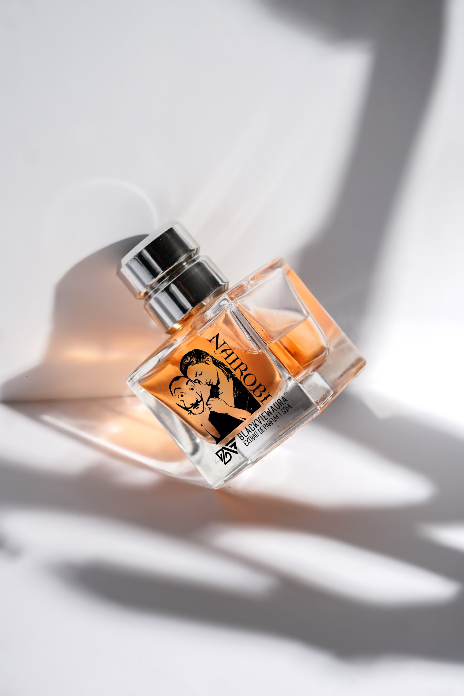 Nairobi: Elegant Rose & Amber Perfume for Bold Moments - BlackView Aura